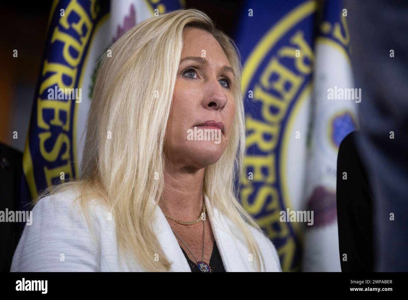 Rep. Marjorie Taylor Greene (R-Ga.) looks on during a press conference ...