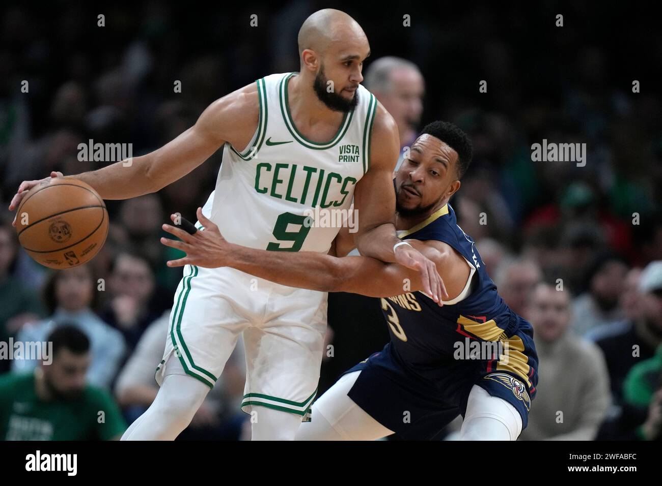 Boston Celtics guard Derrick White (9) drives toward the basket as New ...