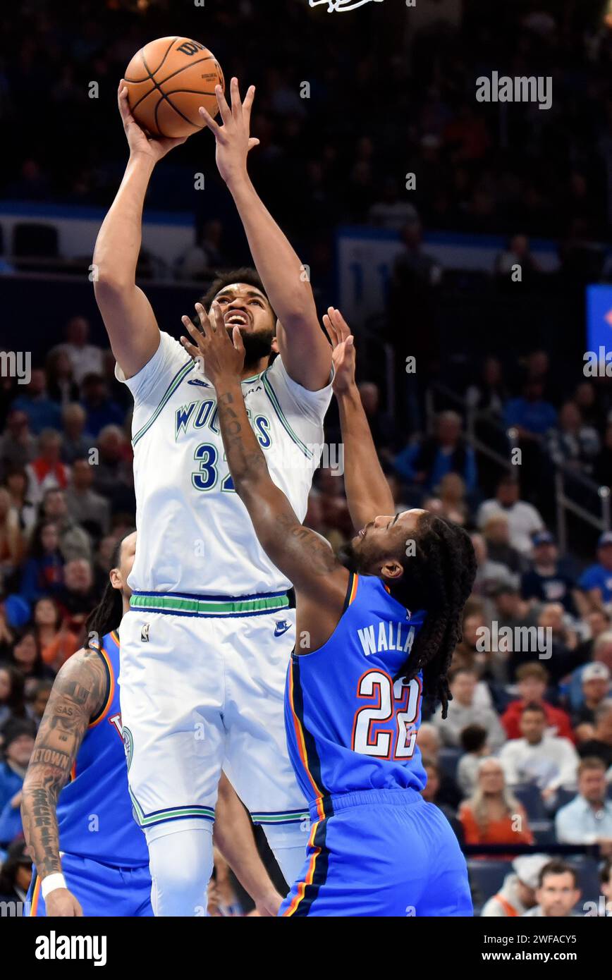 Minnesota Timberwolves center Karl-Anthony Towns, top, shoots over ...