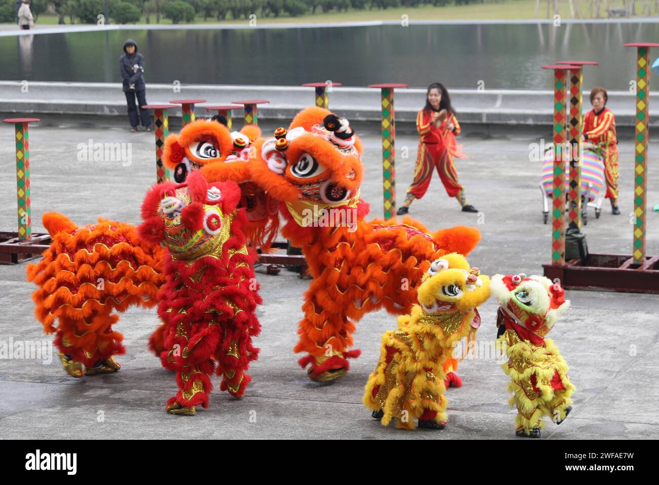 **CHINESE MAINLAND, HONG KONG, MACAU AND TAIWAN OUT** People perform ...