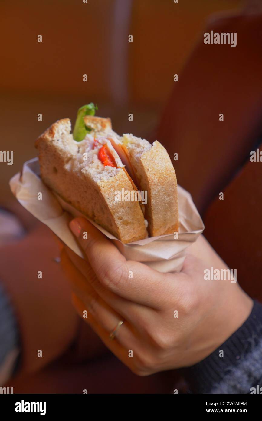 women hand pick Sandwich with ham, cheese, tomatoes Stock Photo - Alamy