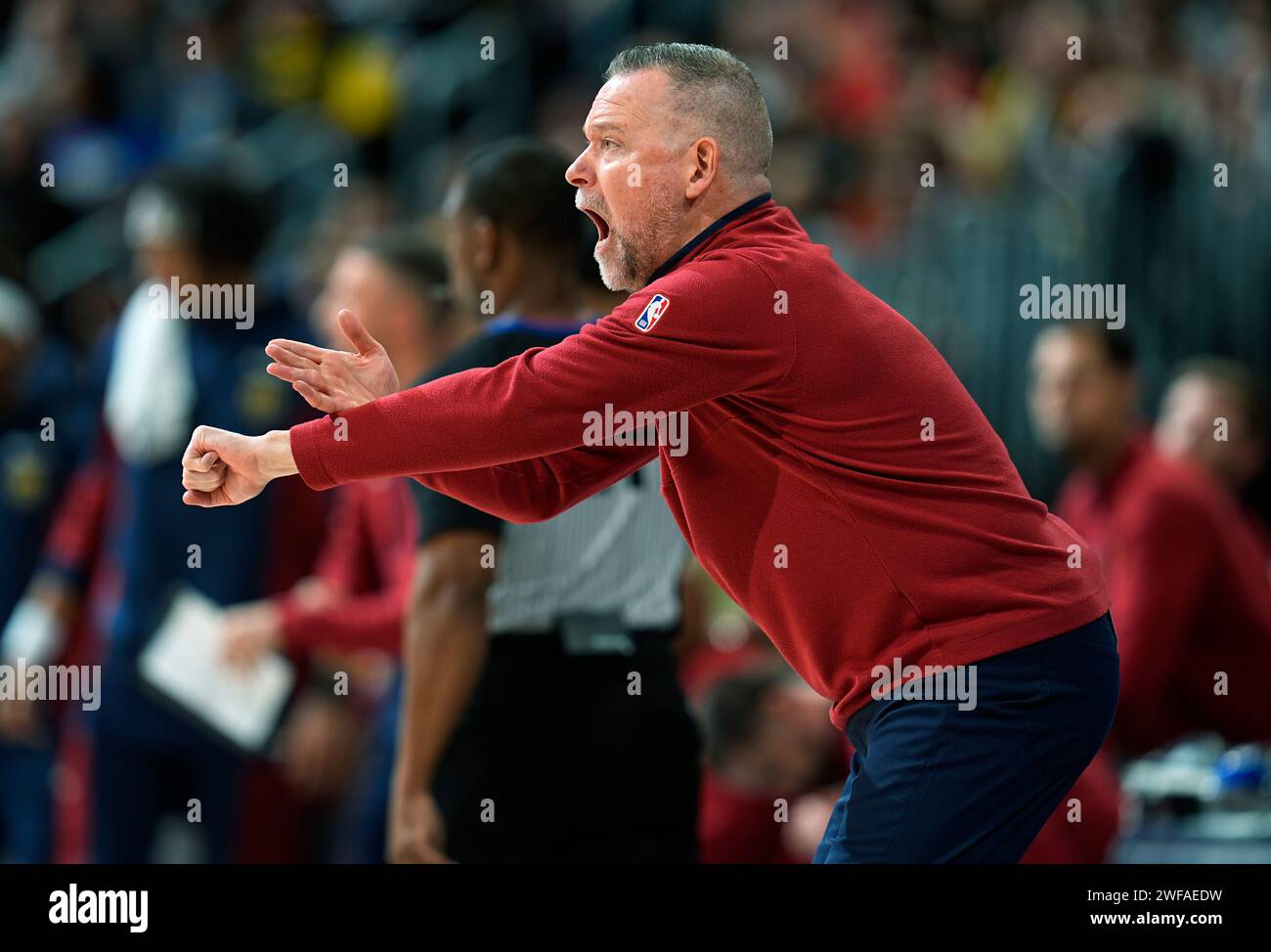 Denver Nuggets head coach Michael Malone directs his team against the ...
