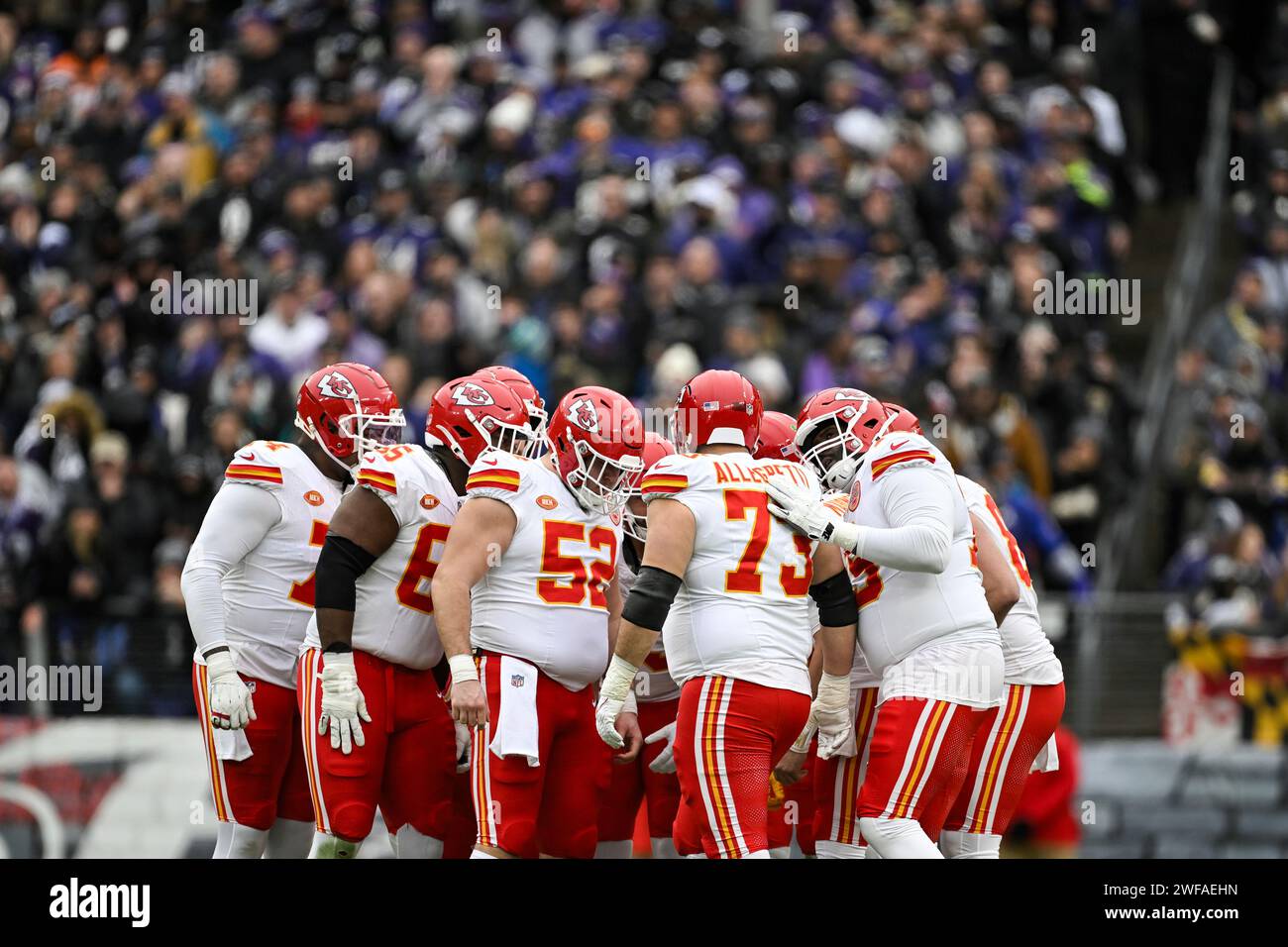 The Kansas City Chiefs offense huddles during the first half of the AFC ...