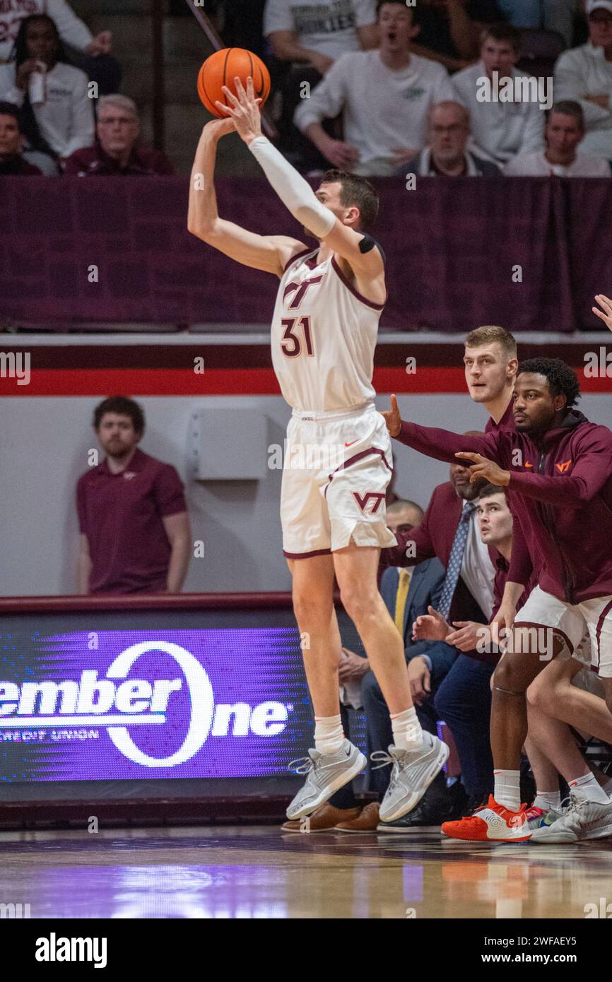 Virginia Tech's Robbie Beran goes up to shoot a 3-point basket against ...