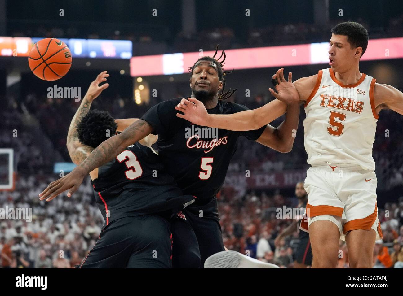 Houston guard Ramon Walker Jr. (3), forward Ja'Vier Francis, center ...