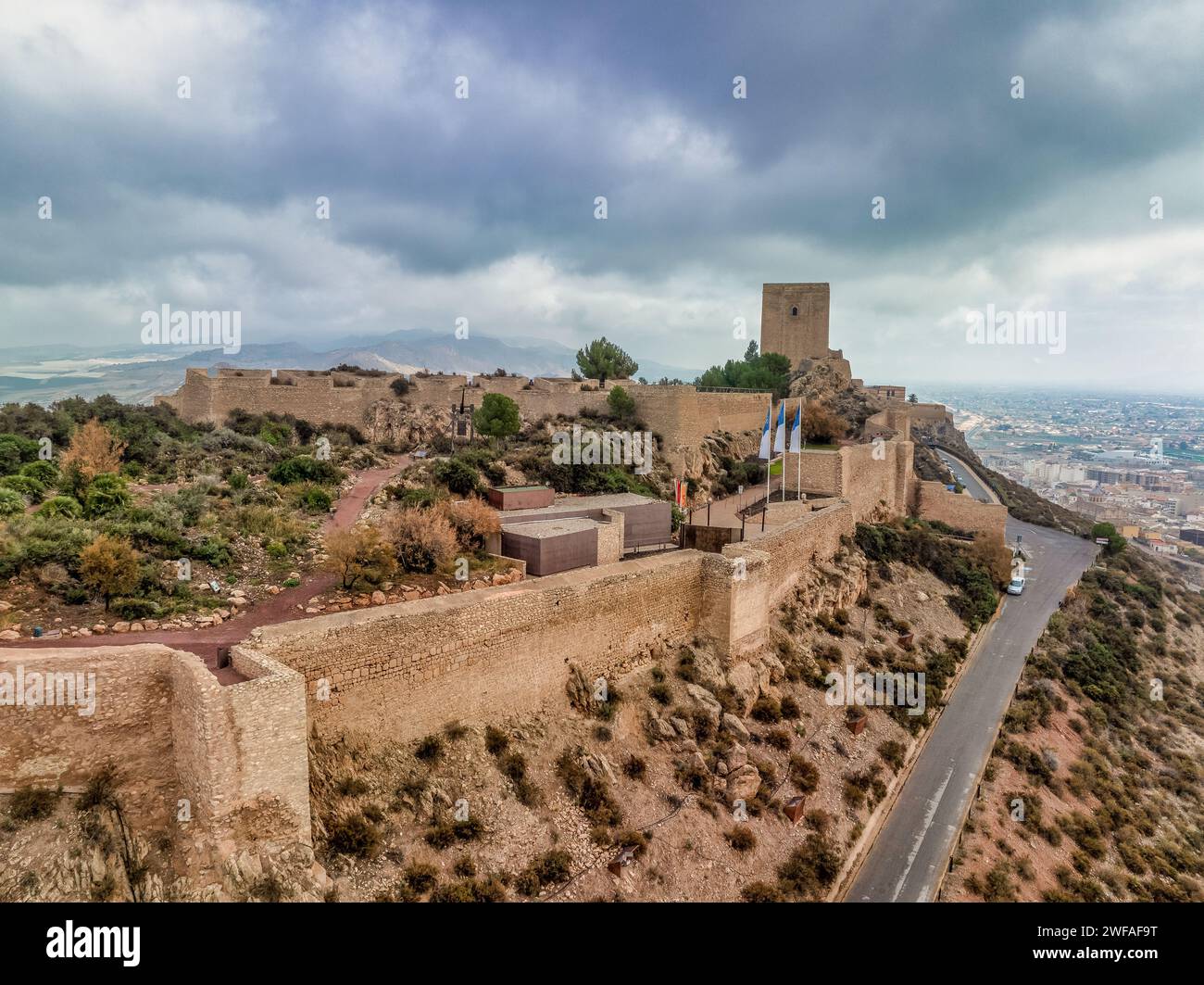 Aerial view of Lorca medieval castle with Tour de Alfonz, square towers ...