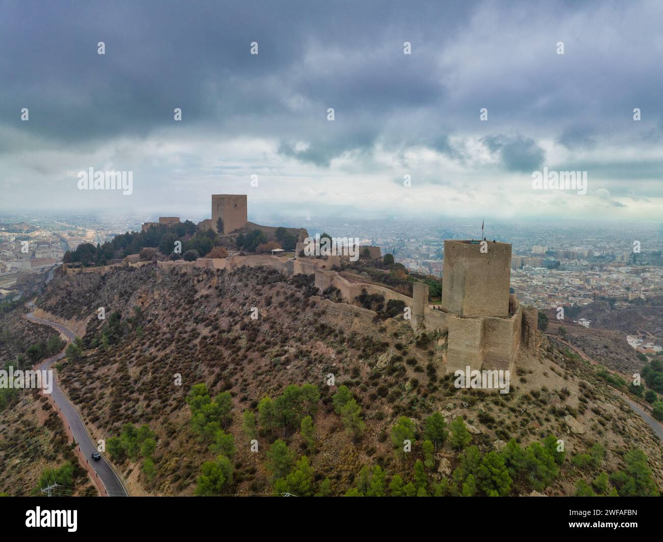 Aerial view of Lorca medieval castle with Tour de Alfonz, square towers ...