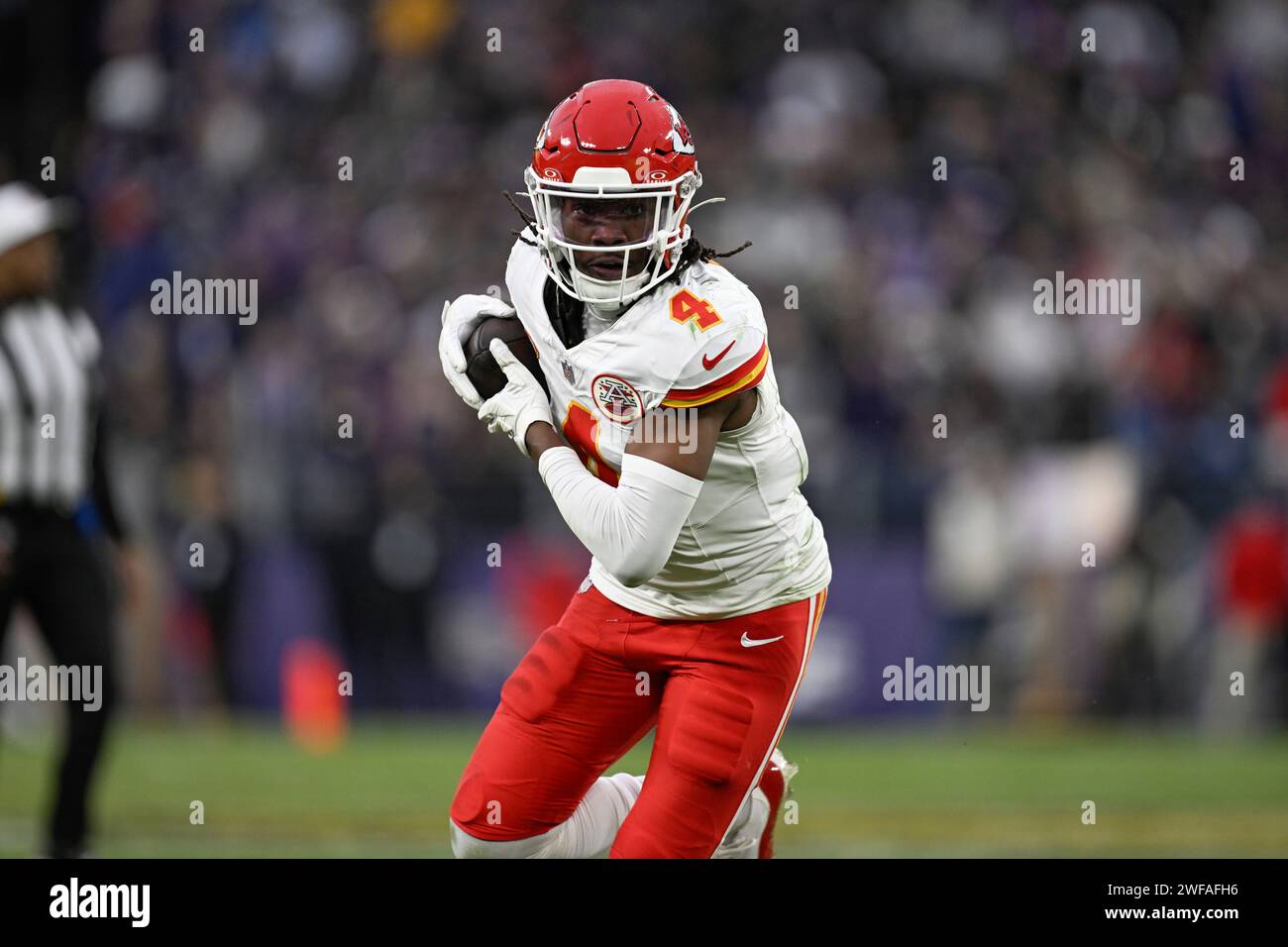 Kansas City Chiefs wide receiver Rashee Rice (4) runs with the ball ...