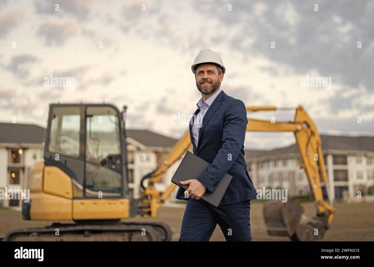 businessman with building plan, advertisement. businessman check ...