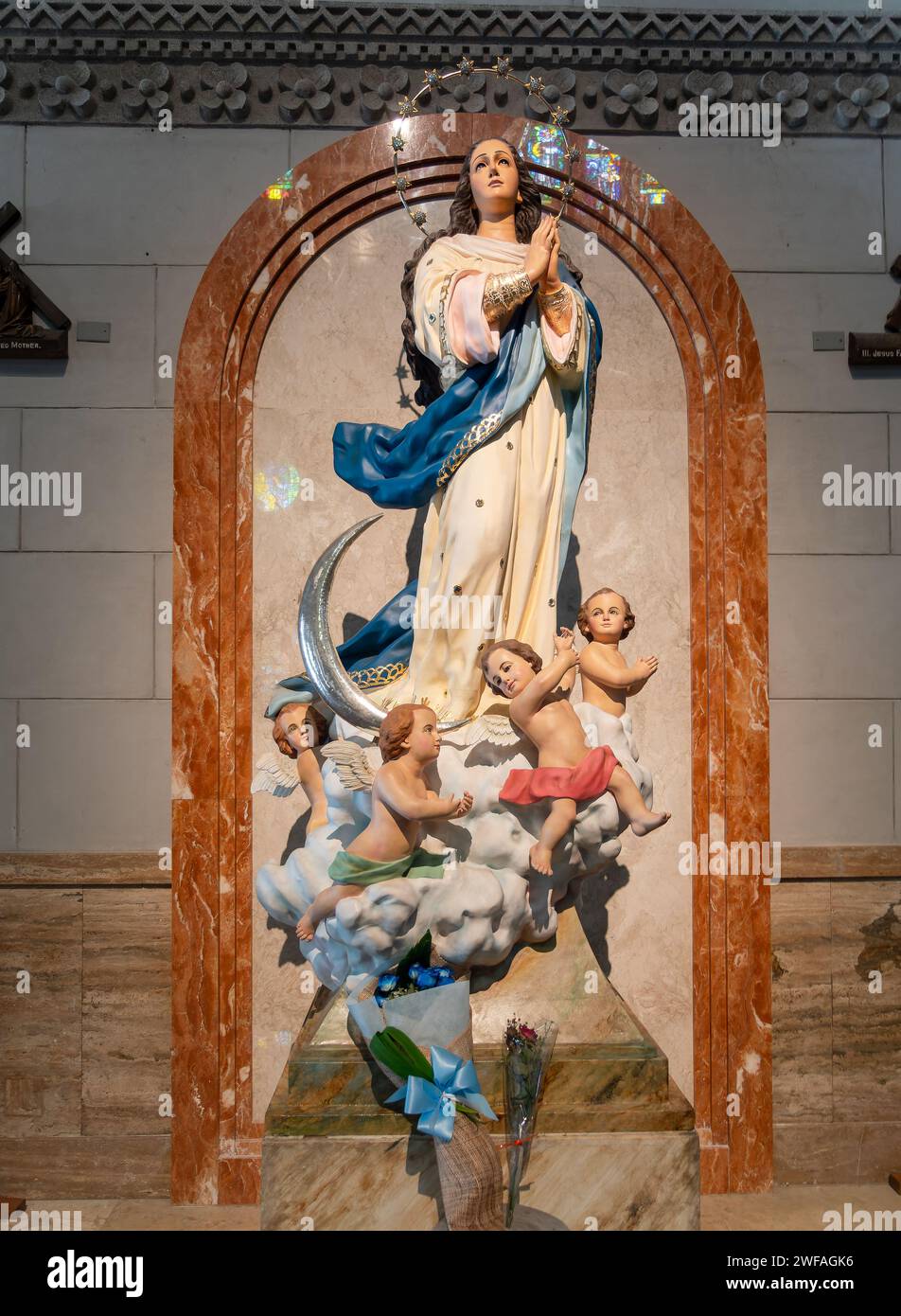 Manila, The Philippines - August 8, 2017: Wooden image of Virgin Mary ...