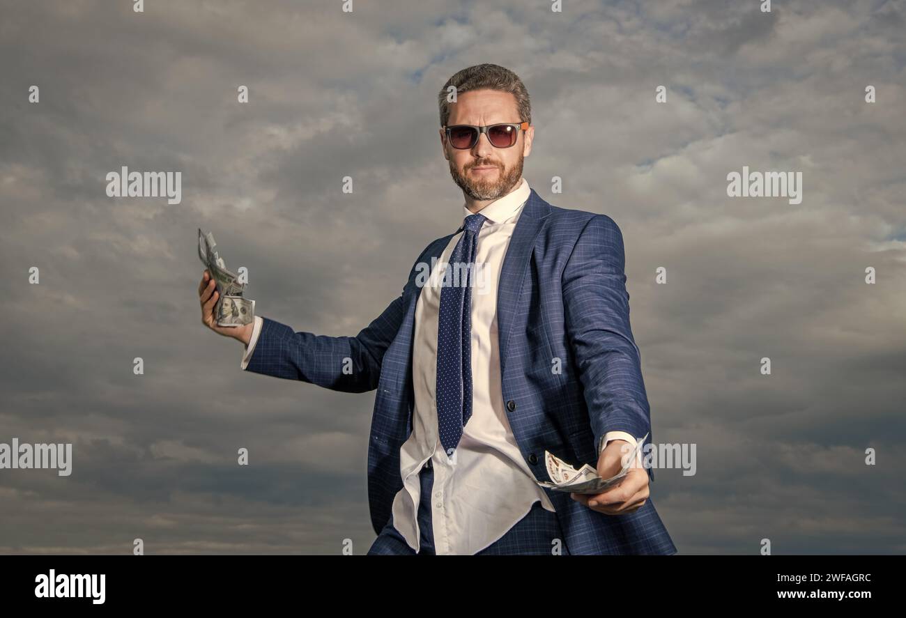 rich billionaire man with money in suit. photo of billionaire man with ...