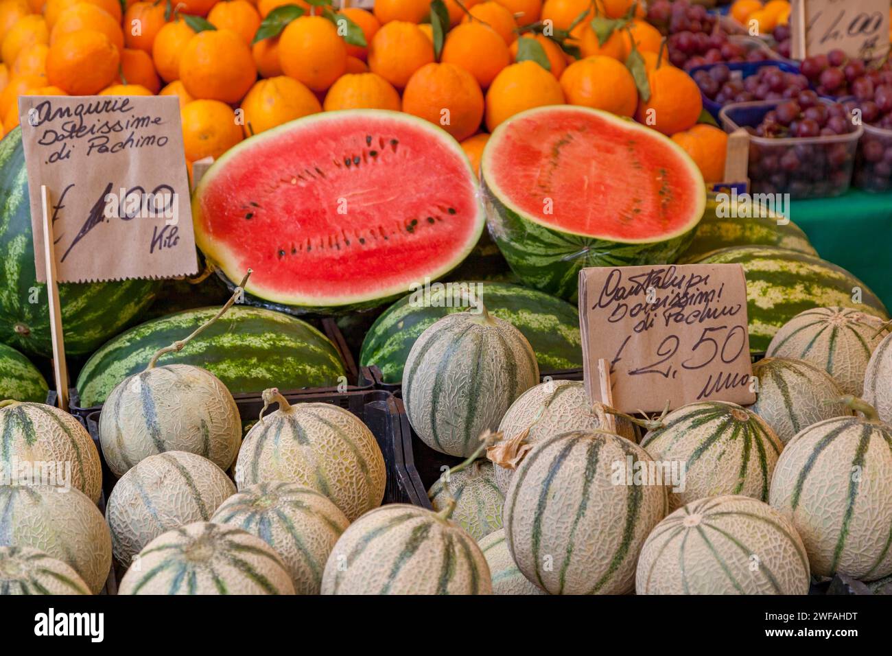 Market stall with melons and oranges, weekly market market, Catania ...