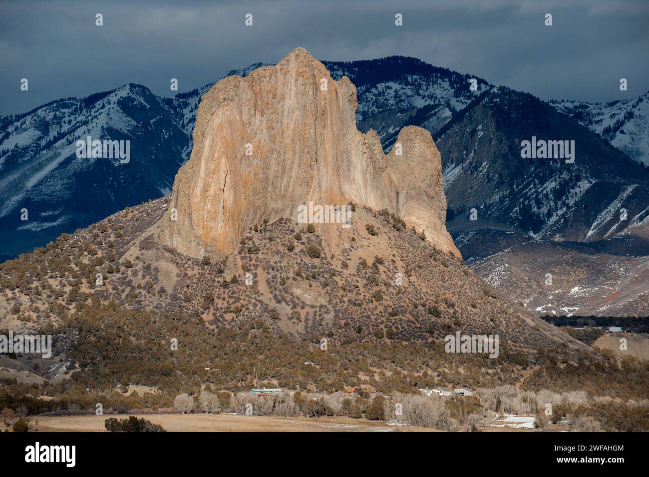 Needle Rock, an old lava plug near Crawford, Colorado and the West Elk ...