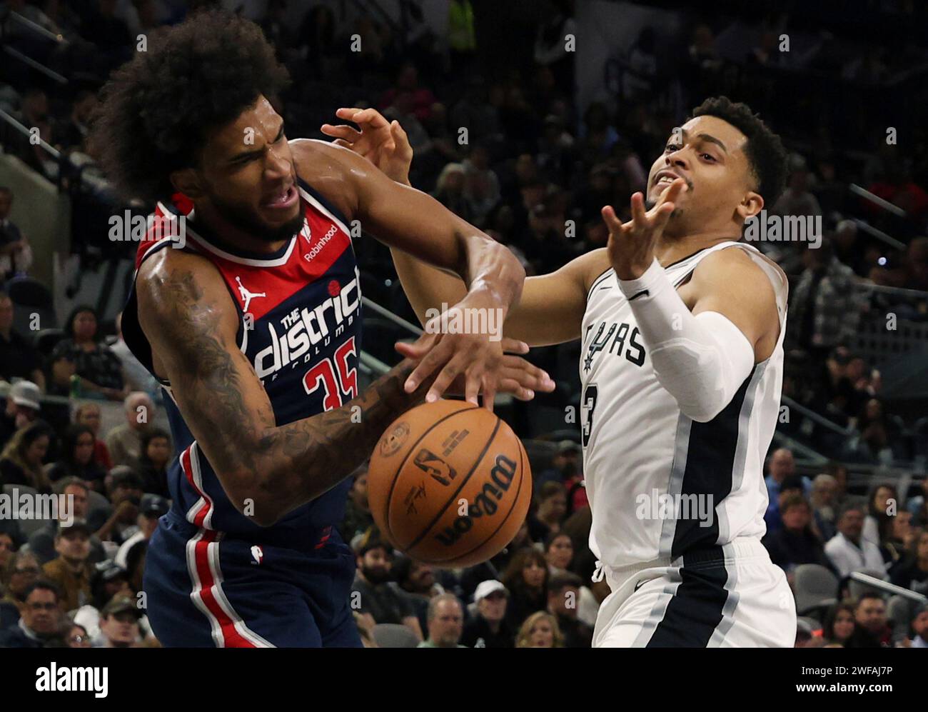 Washington Wizards forward Marvin Bagley III, left, and San Antonio ...