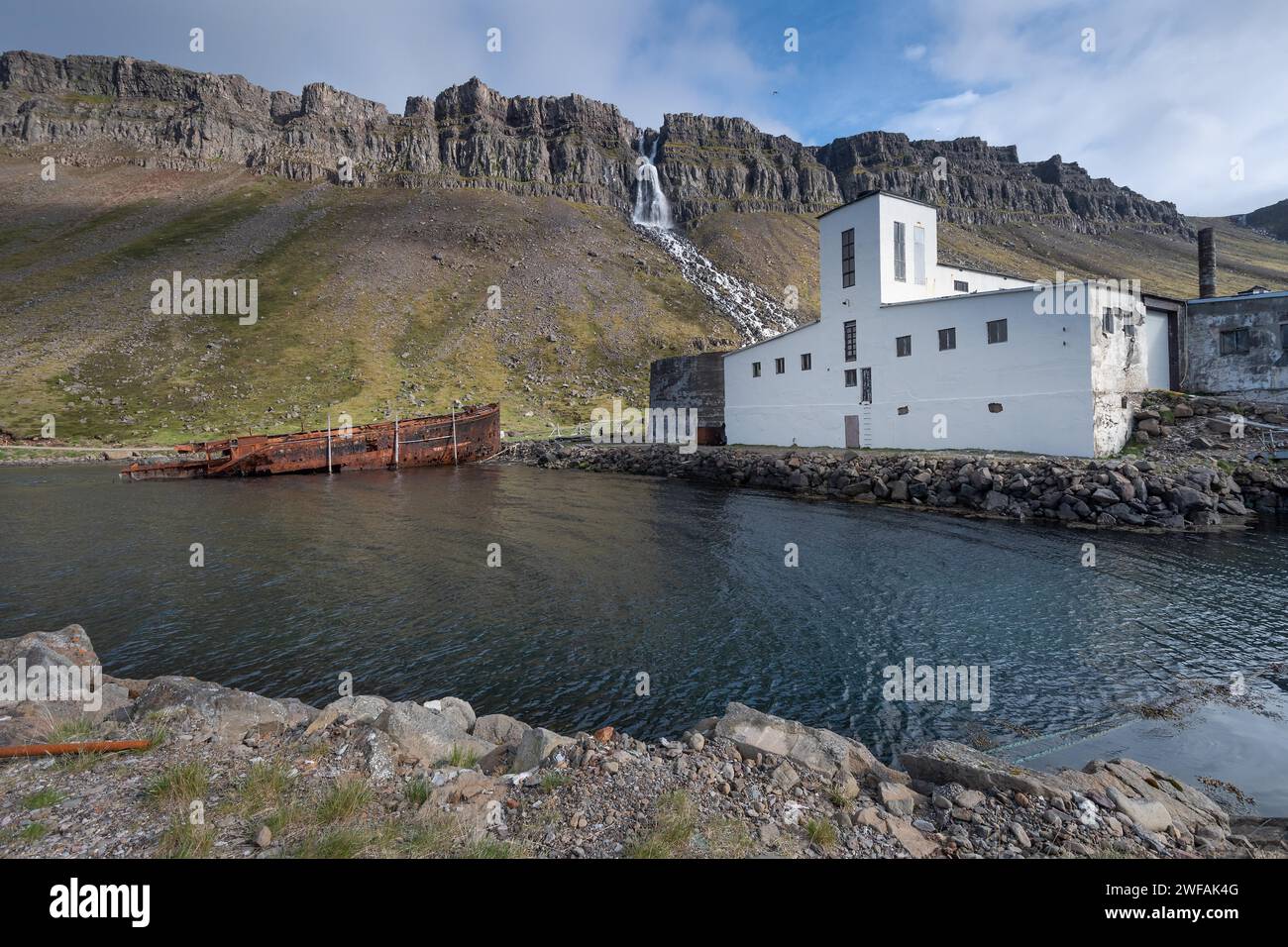 Baejararfoss waterfall, shipwreck, abandoned herring factory Djupavik ...