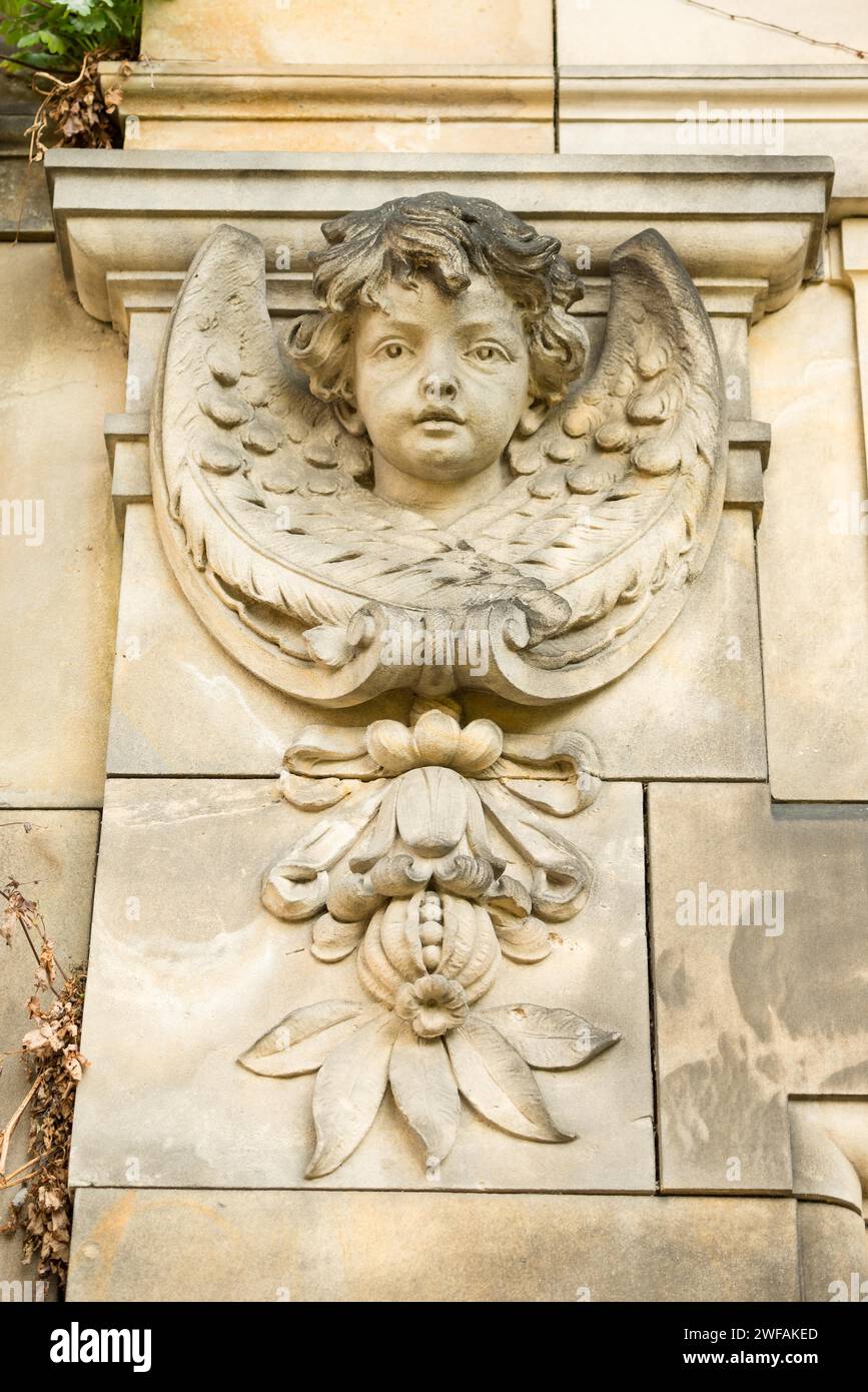 Historic stone angel figure, angel figure, angel with open gaze and ...