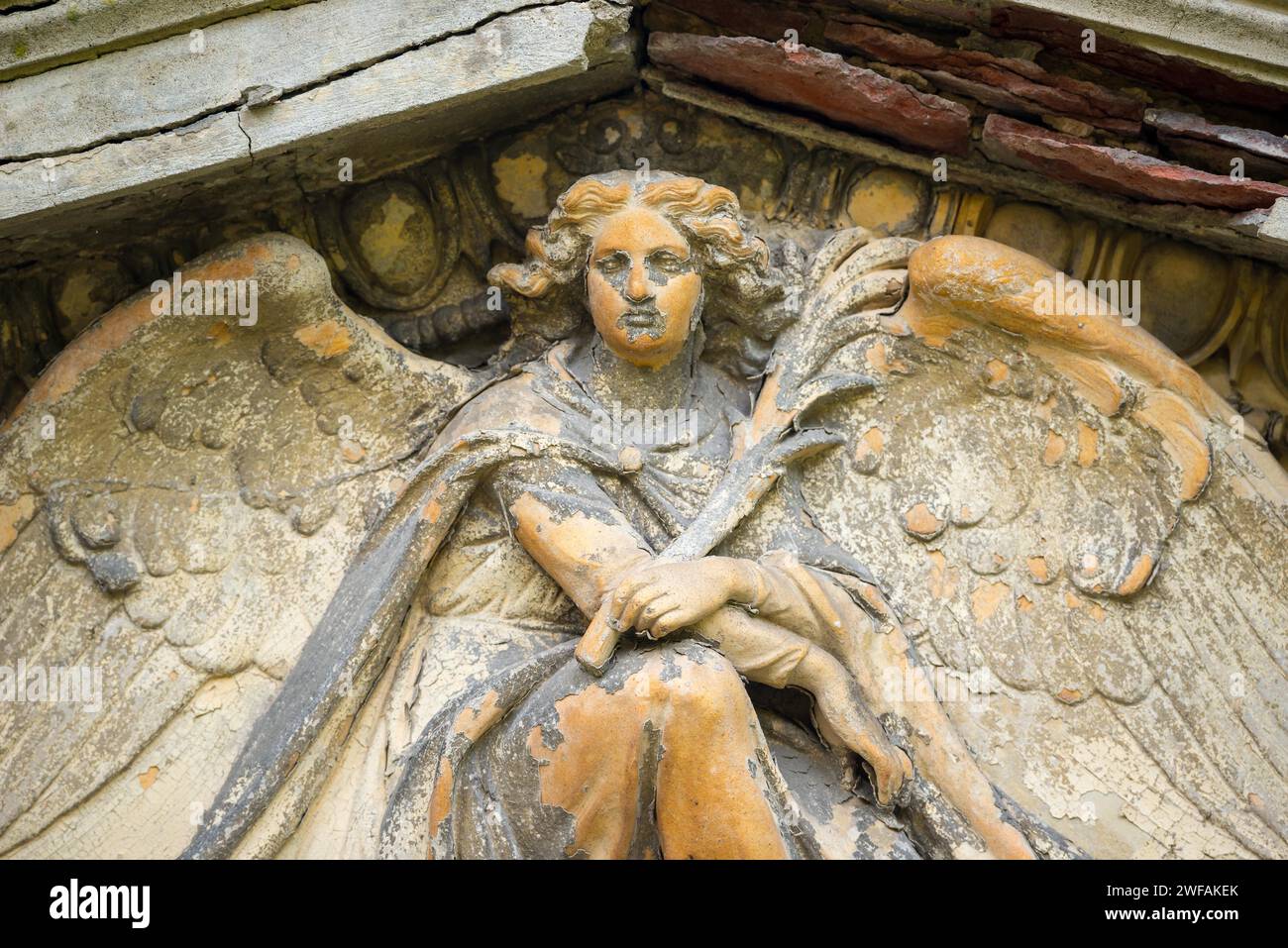 Historic angel with curls, cape and feather, angel statue, angel figure ...