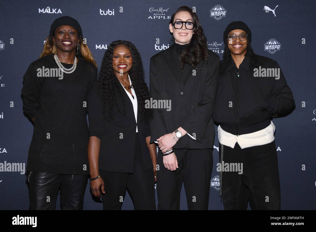 New York, USA. 29th Jan, 2024. (L-R) Essence Carson, Marie Ferdinand-Harris, Breanna Stewart and ...