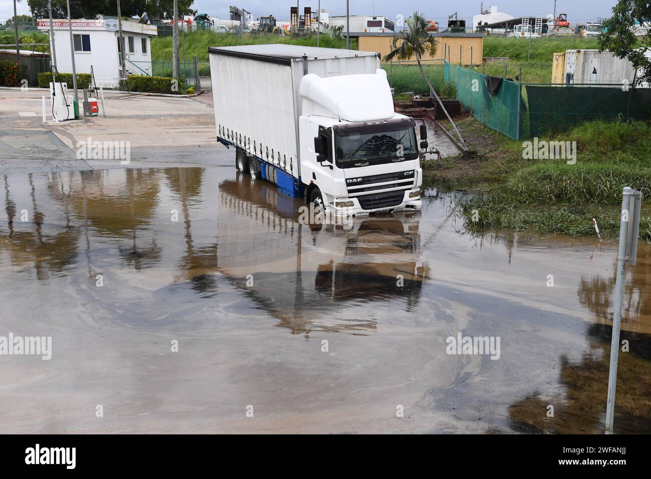 Brisbane, Australia. 01st Jan, 2016. Flooded trucks are seen near the ...