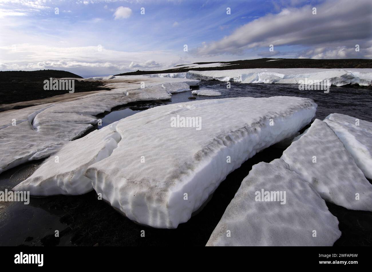 Spring melt in the Miohusaa river above the town of Egilstadir, east ...