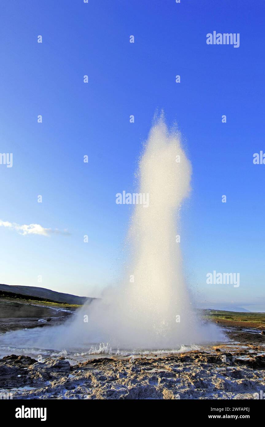 The geyser Strokkur fires steam and boiling water up to a height of ...