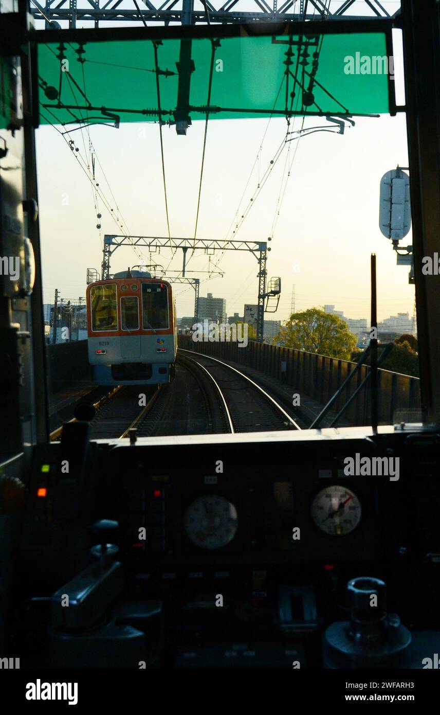 A train journey on the local train from Kobe to Osaka, Japan Stock ...