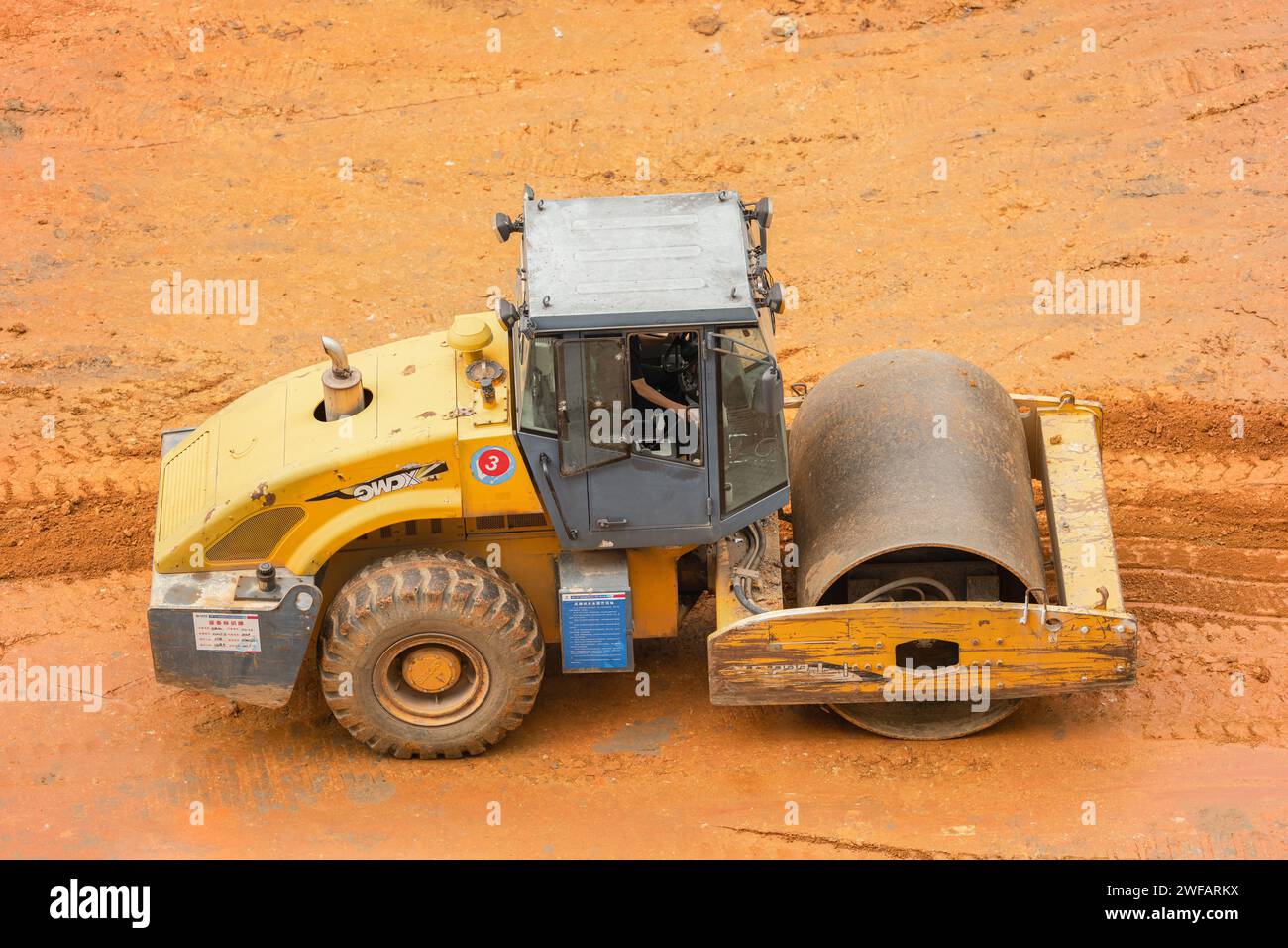 Excavator digging the land Stock Photo - Alamy
