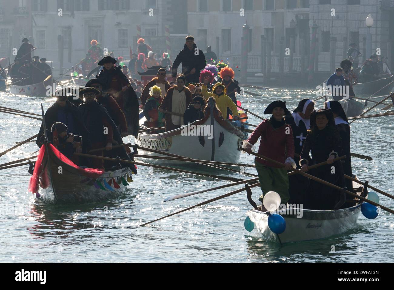 Boats sail during the traditional rowing parade, part of the Venice ...