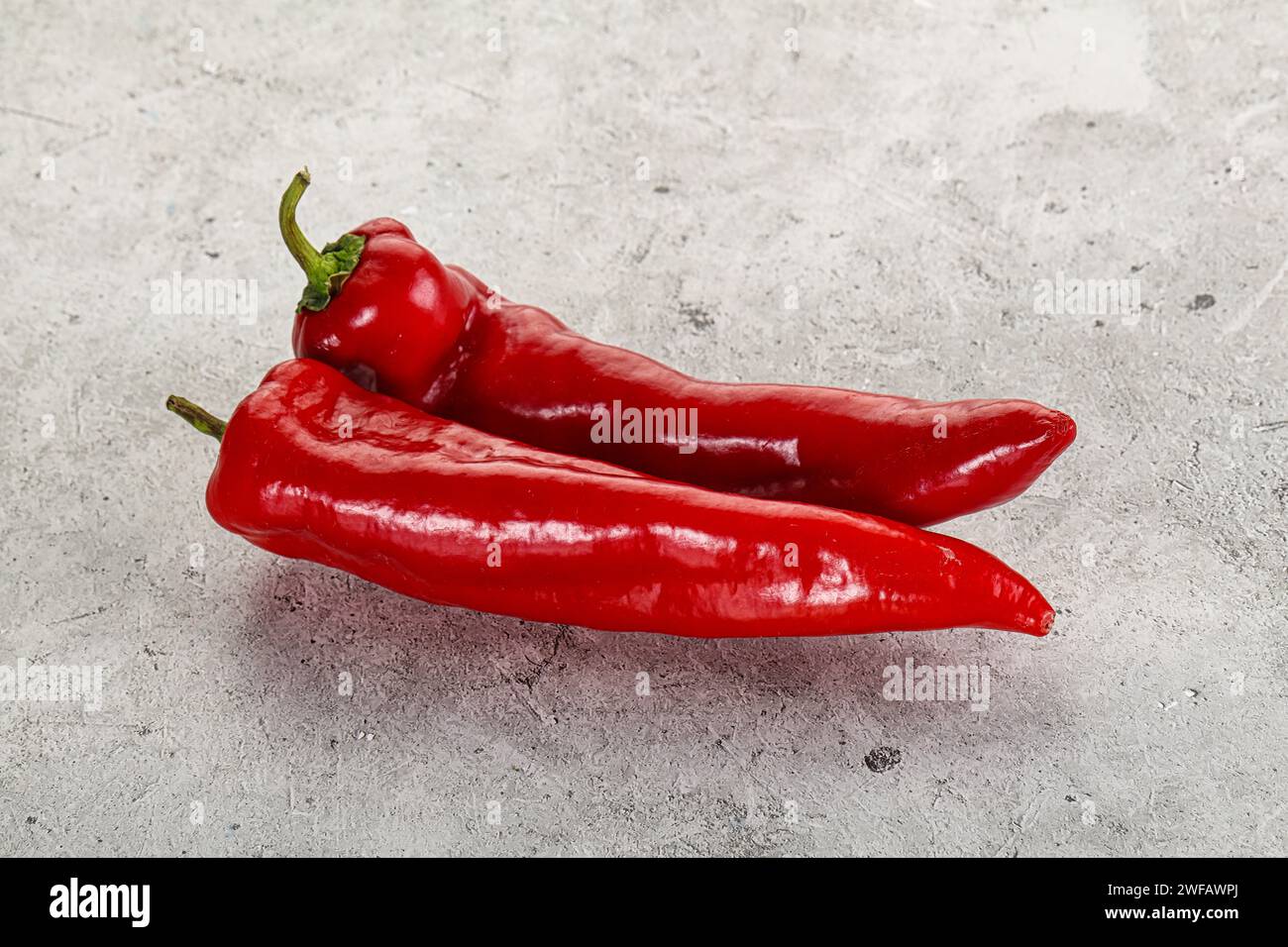 Two red sweet Ramiro organic pepper Stock Photo - Alamy