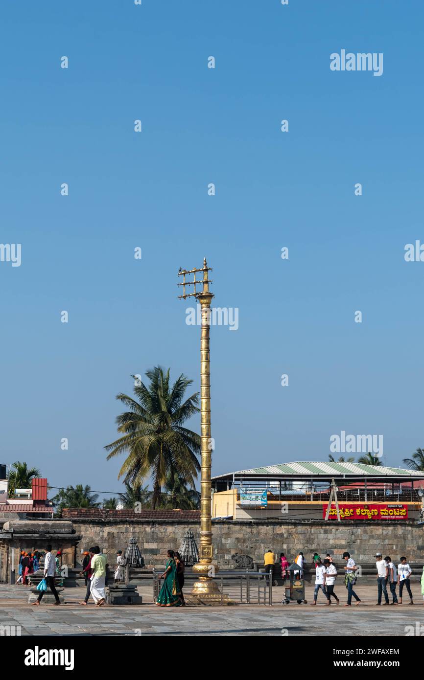 Belur, Karnataka, India - January 9 2023: The golden Dhwaja Stambh ...
