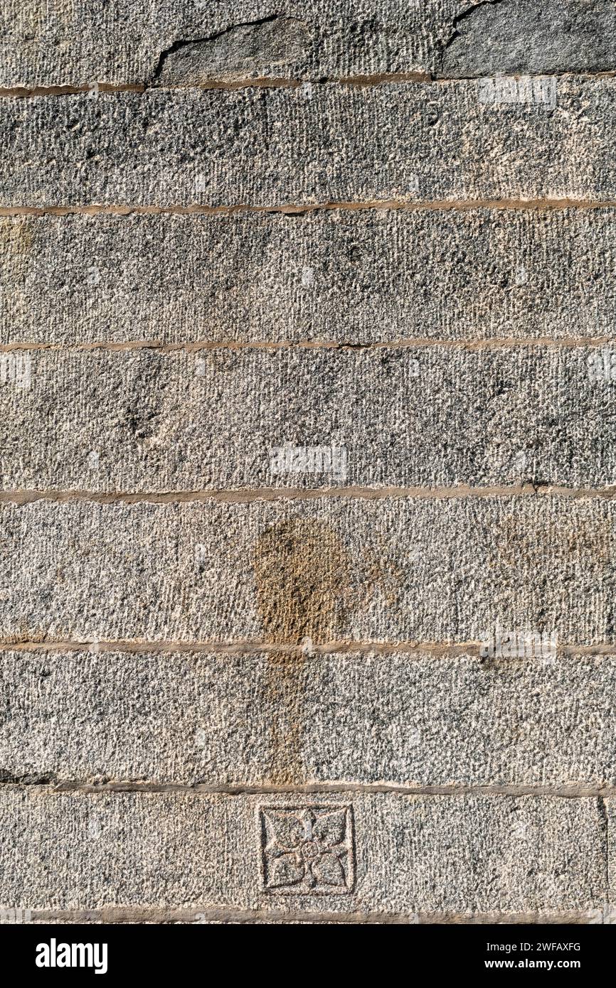 Beautiful decorative designs on the ancient stone walls of the ...