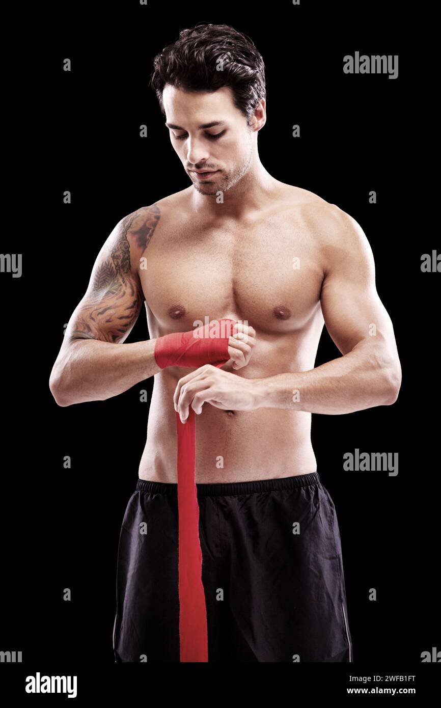Man, hand wrap and fitness with fighter in a studio ready for boxing ...