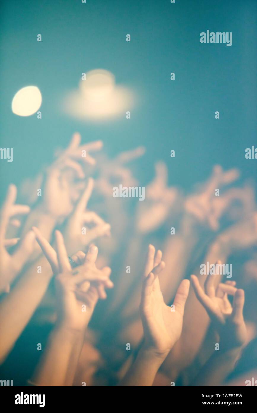 Rock concert, crowd and people with music and hands with musician ...