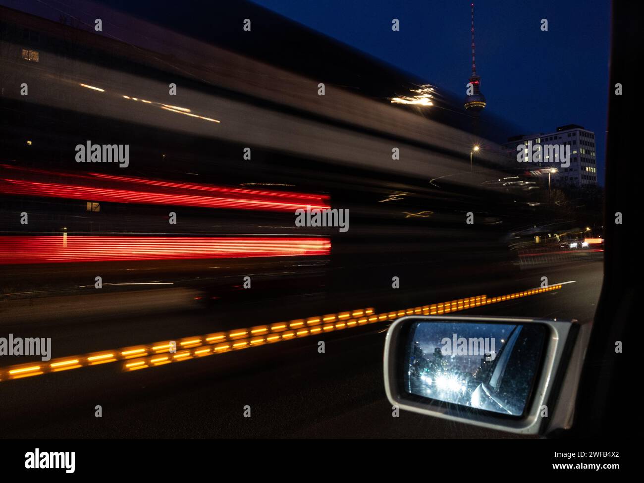 Berlin, Germany. 30th Jan, 2024. View of a passing truck through the ...