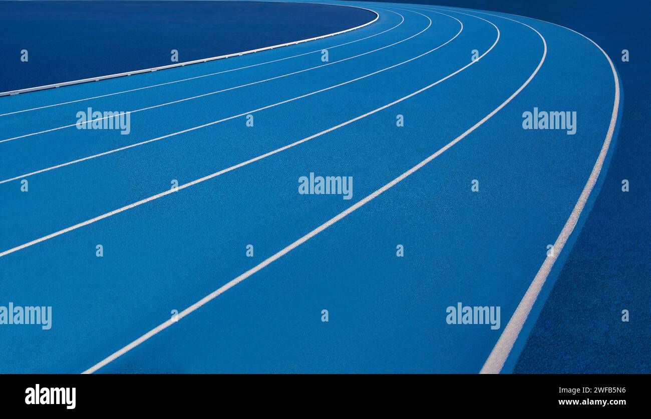 Blue Olympic track lanes with white stripes, an empty background ...