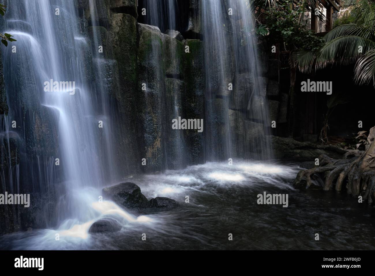 Small waterfall and dark rocks at Palma de Mallorca aquarium Stock ...