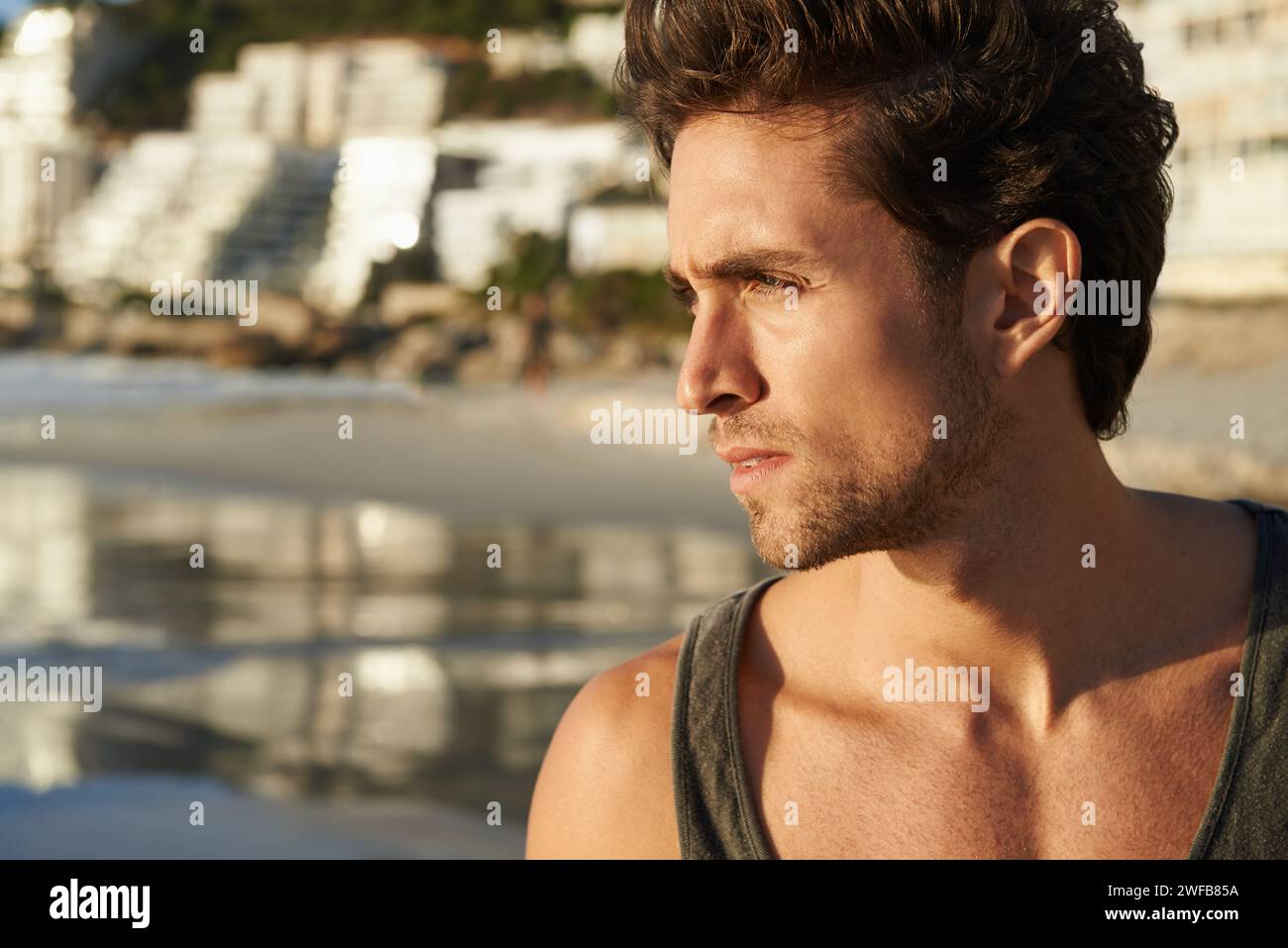 Man, beach and thinking by ocean with travel, summer vacation and ...