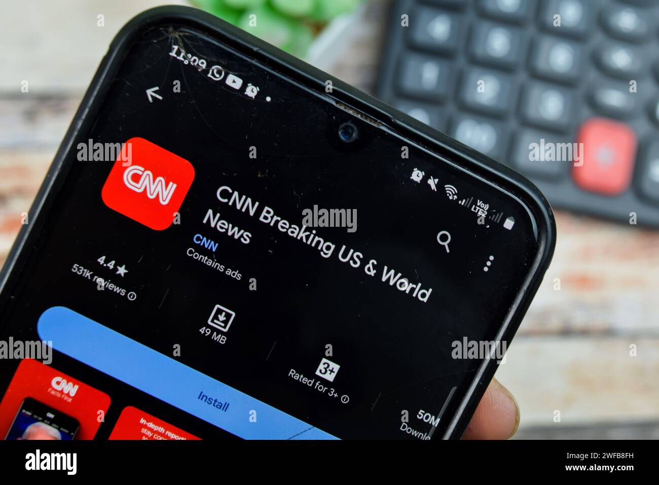 CNN Breaking US & World News application on Smartphone screen. CNN is a ...