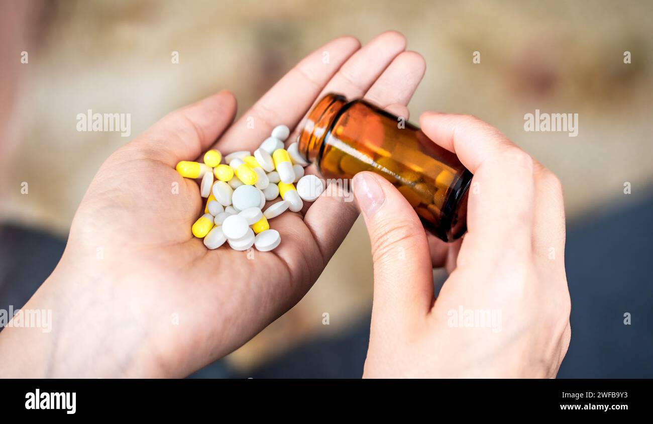 Close up hands removing pill hi-res stock photography and images - Alamy