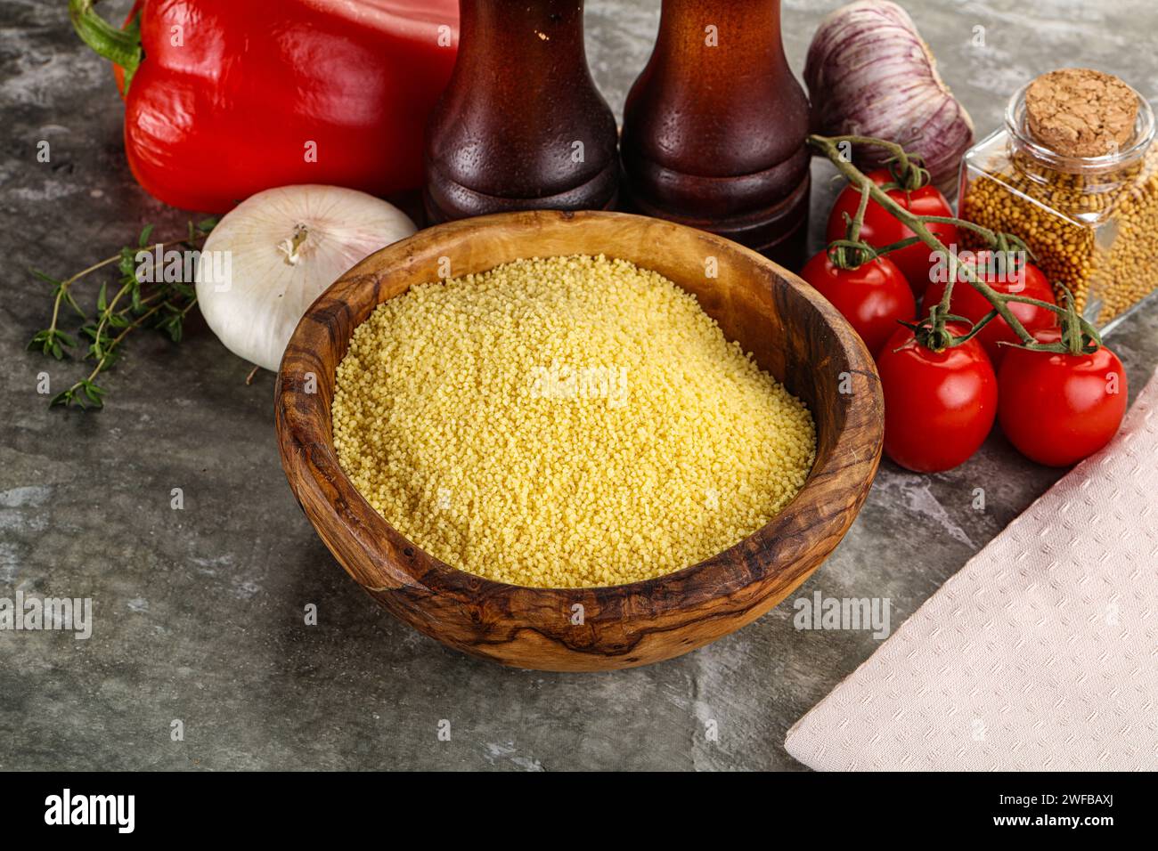 Raw dry wheat couscous grain for cooking Stock Photo - Alamy