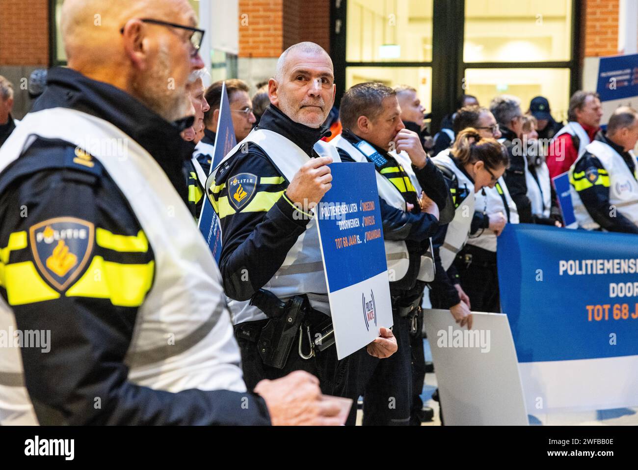 THE HAGUE - Activists during a demonstration in the Ministry of Social ...