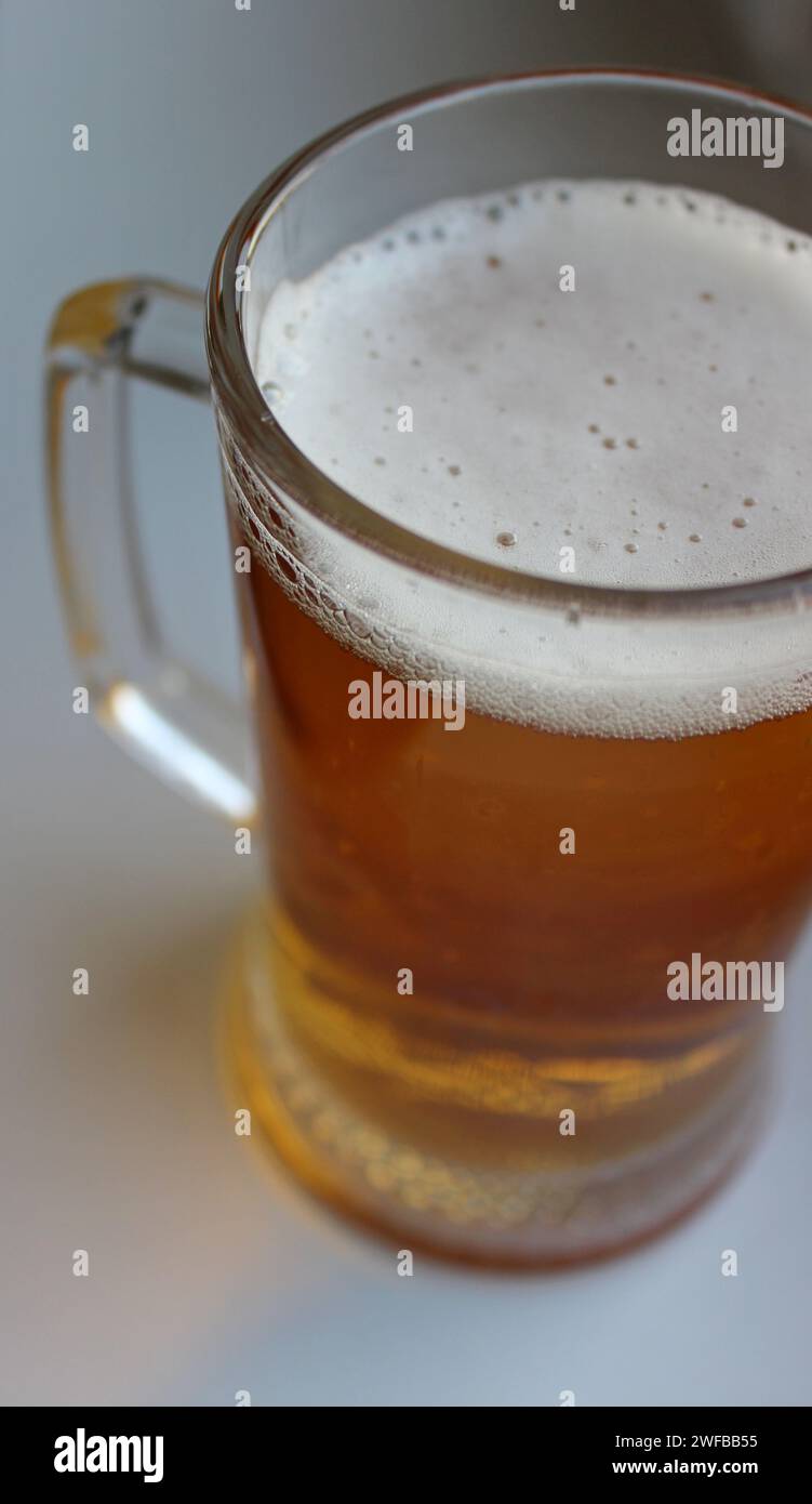Half filled beer mug hi-res stock photography and images - Alamy