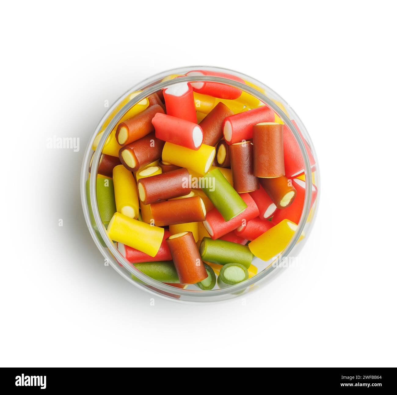 Sweet colorful chewy candy sticks in jar isolated on the white ...