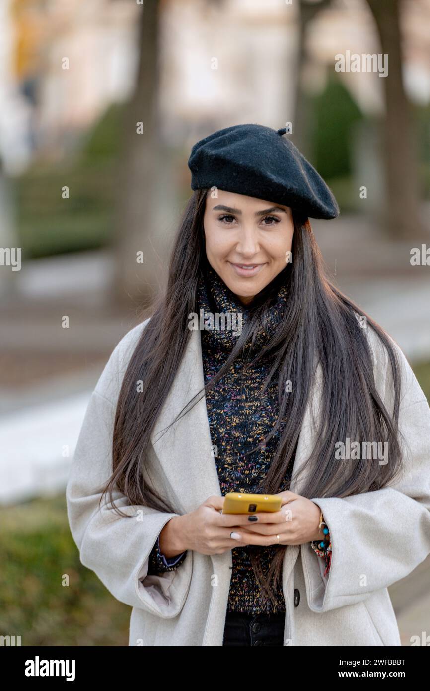 Woman in long coat checks hi-res stock photography and images - Alamy
