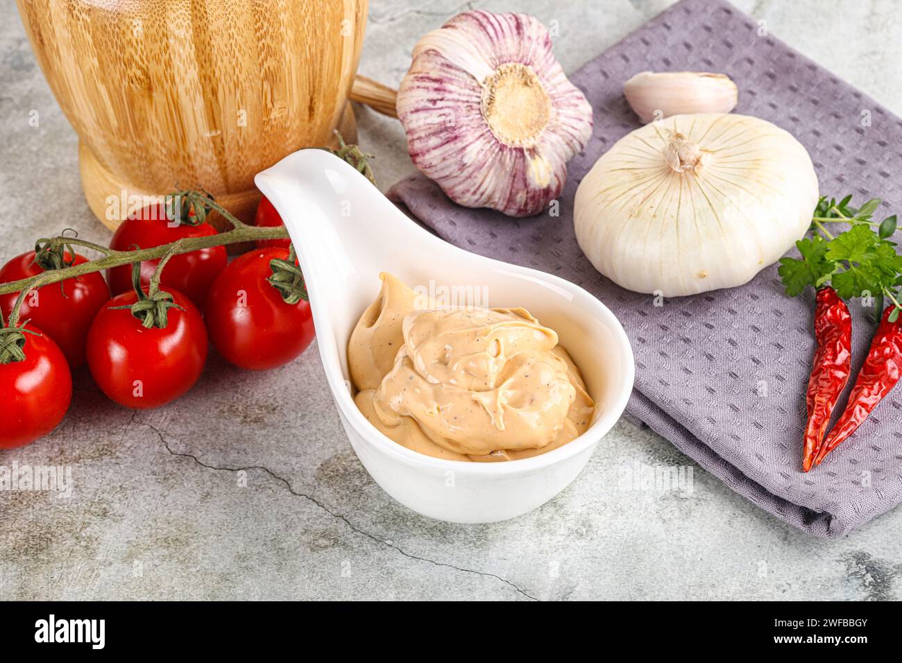 Bowl of Yellow cream grill sauce for burger Stock Photo - Alamy