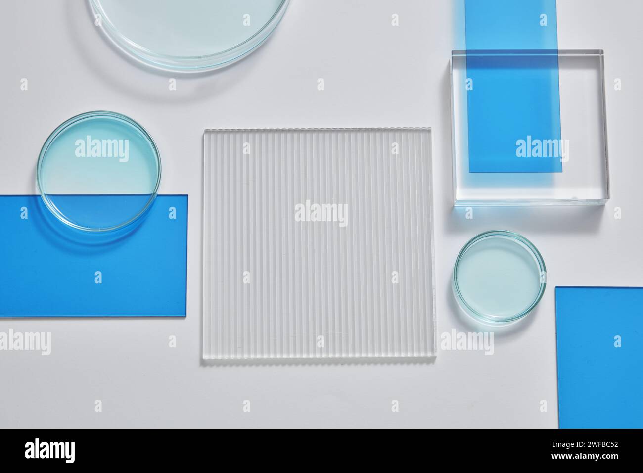 Flat lay of assorted laboratory glassware equipment showcase on white ...