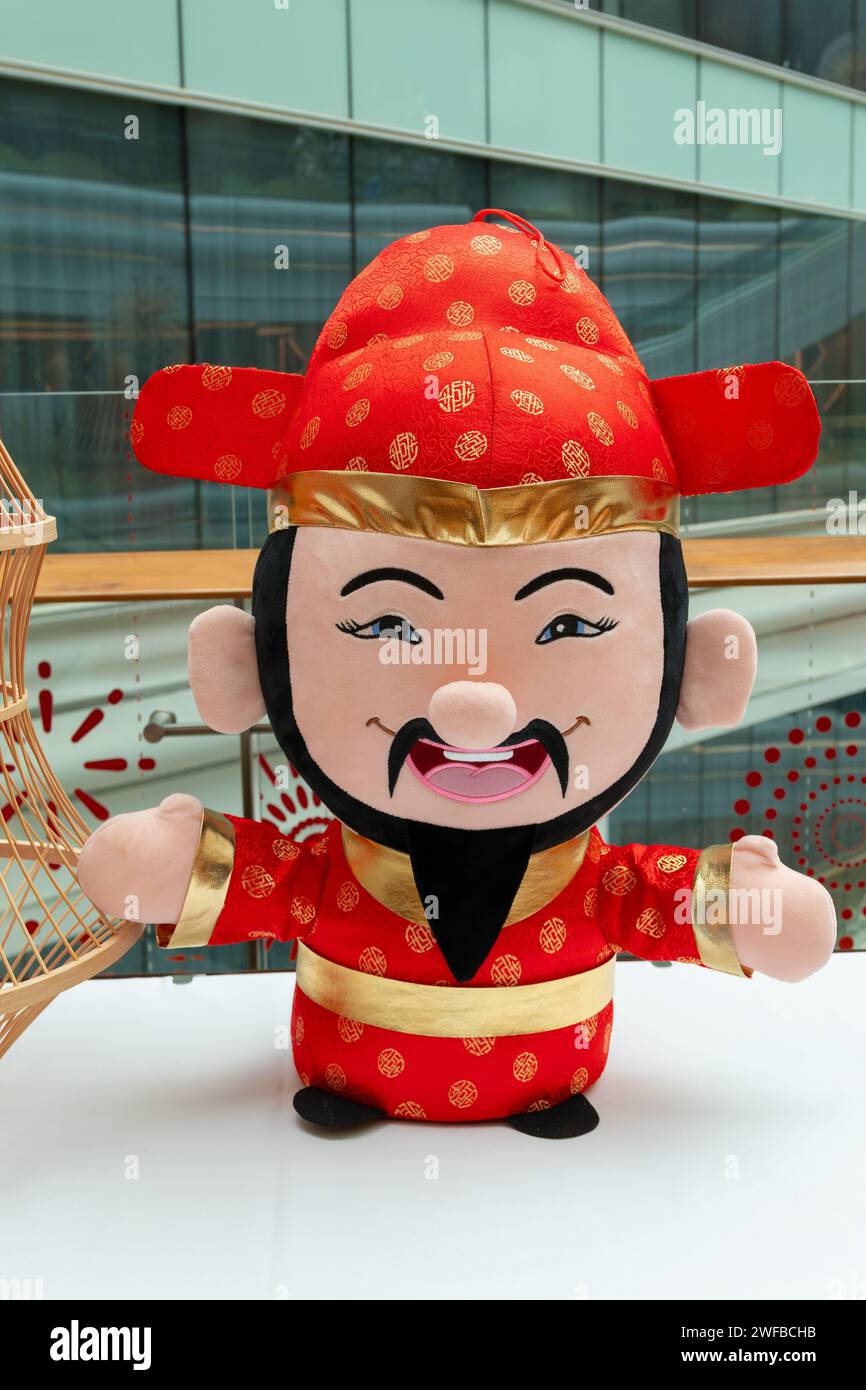cute doll of the God of Prosperity at vertical composition Stock Photo ...