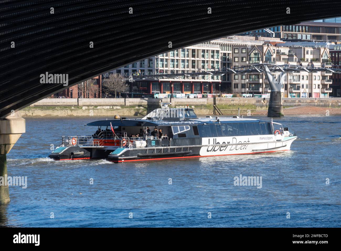 Uber Boat by Thames Clippers after passing under Blackfriars railway ...