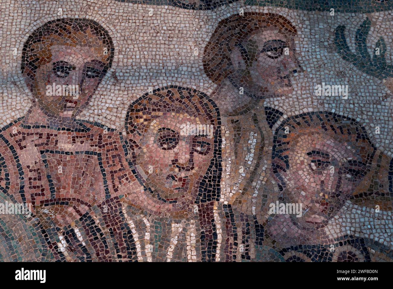 Heads of four hunters. Detail from Late Roman mosaic in the Corridor of ...