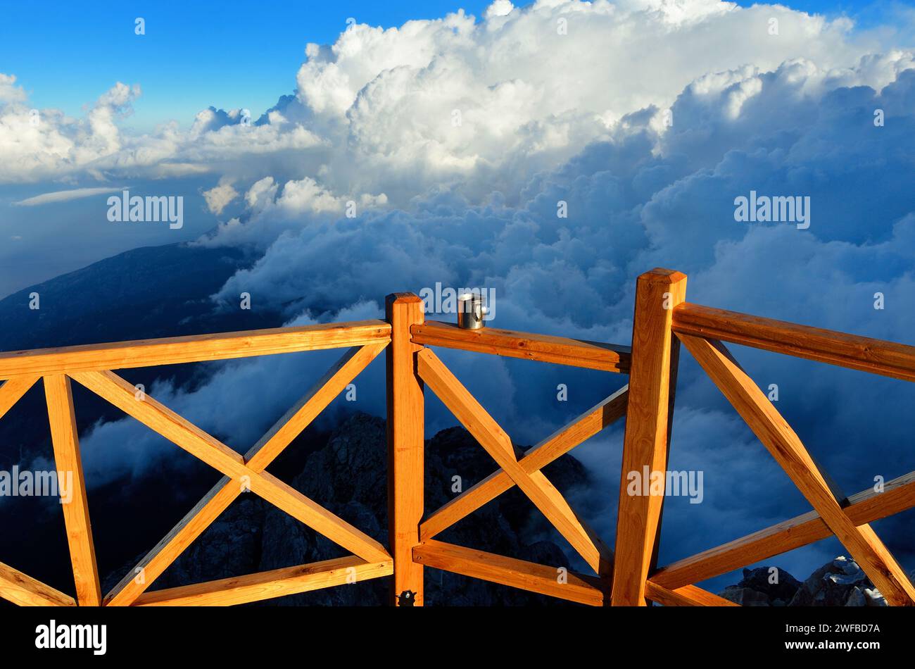 Aerial view of cloud-covered mountains from a mountain observation deck ...